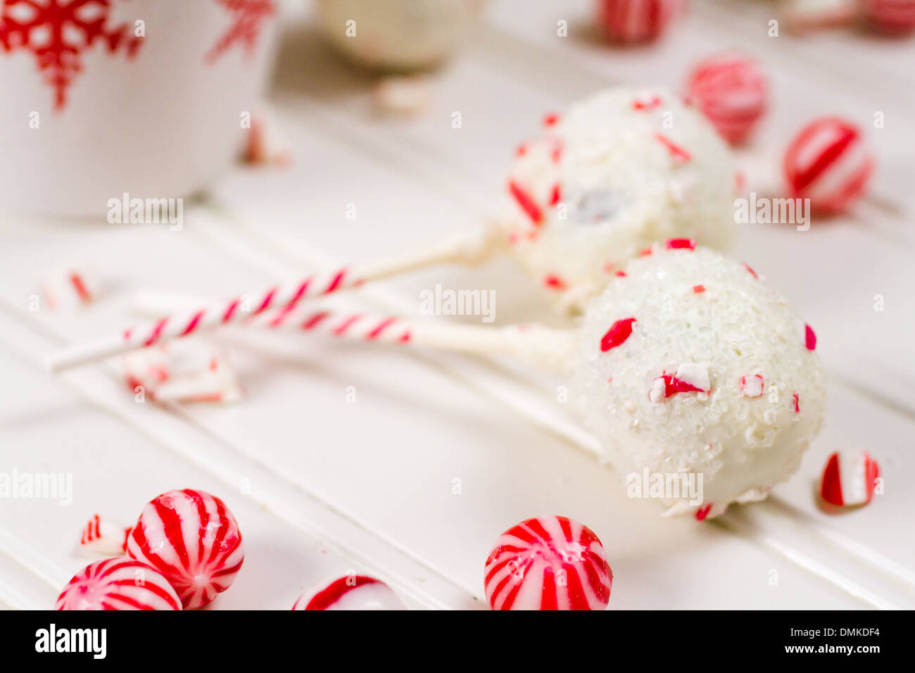 Peppermint chocolate cake pops dipped in white chocolate and candy cane ...