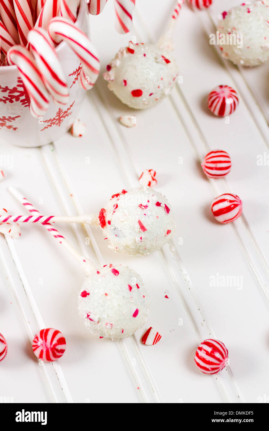 Peppermint chocolate cake pops dipped in white chocolate and candy cane ...