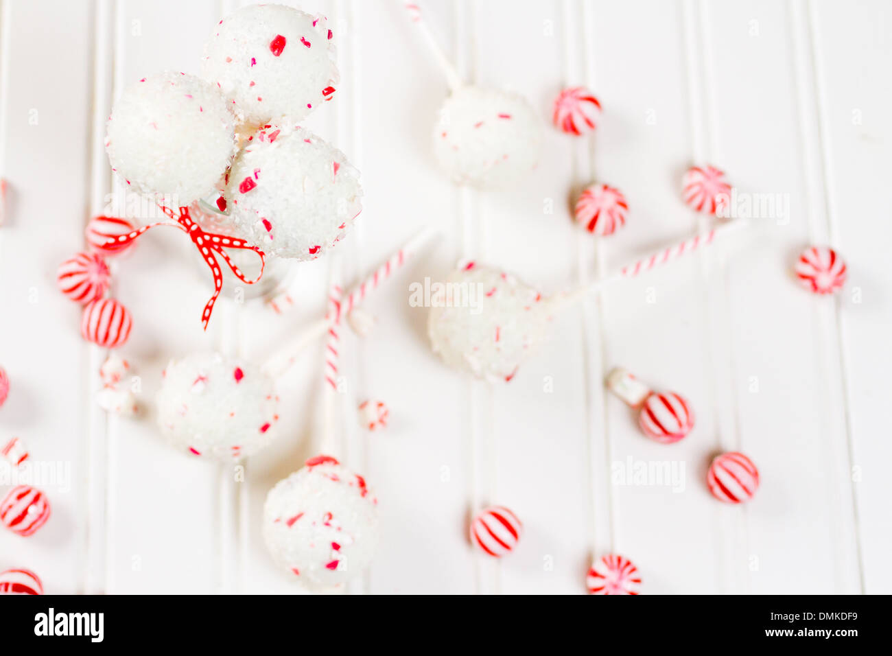Peppermint chocolate cake pops dipped in white chocolate and candy cane ...