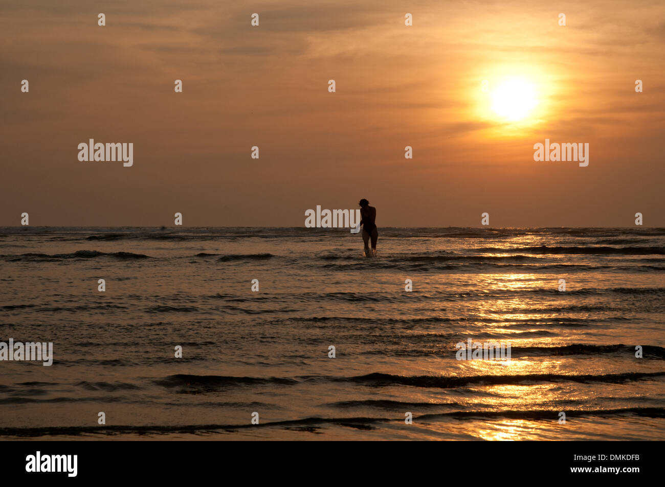 A golden sunset on the beach in Goa, India Stock Photo - Alamy