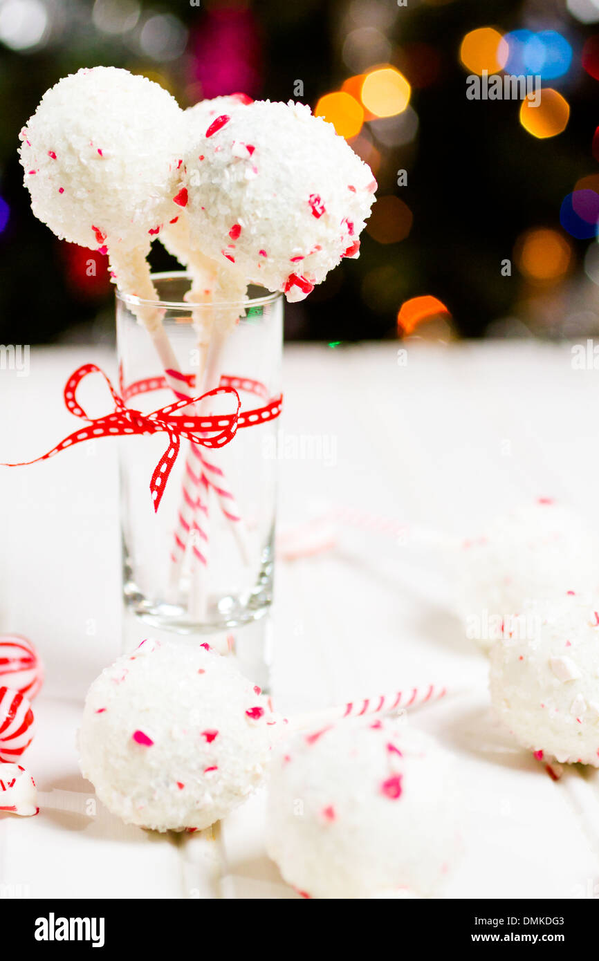 Peppermint chocolate cake pops dipped in white chocolate and candy cane ...