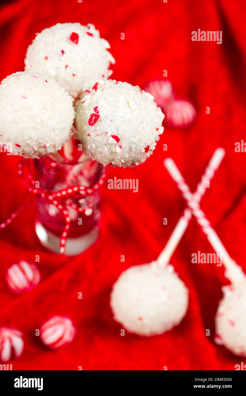 Peppermint chocolate cake pops dipped in white chocolate and candy cane ...