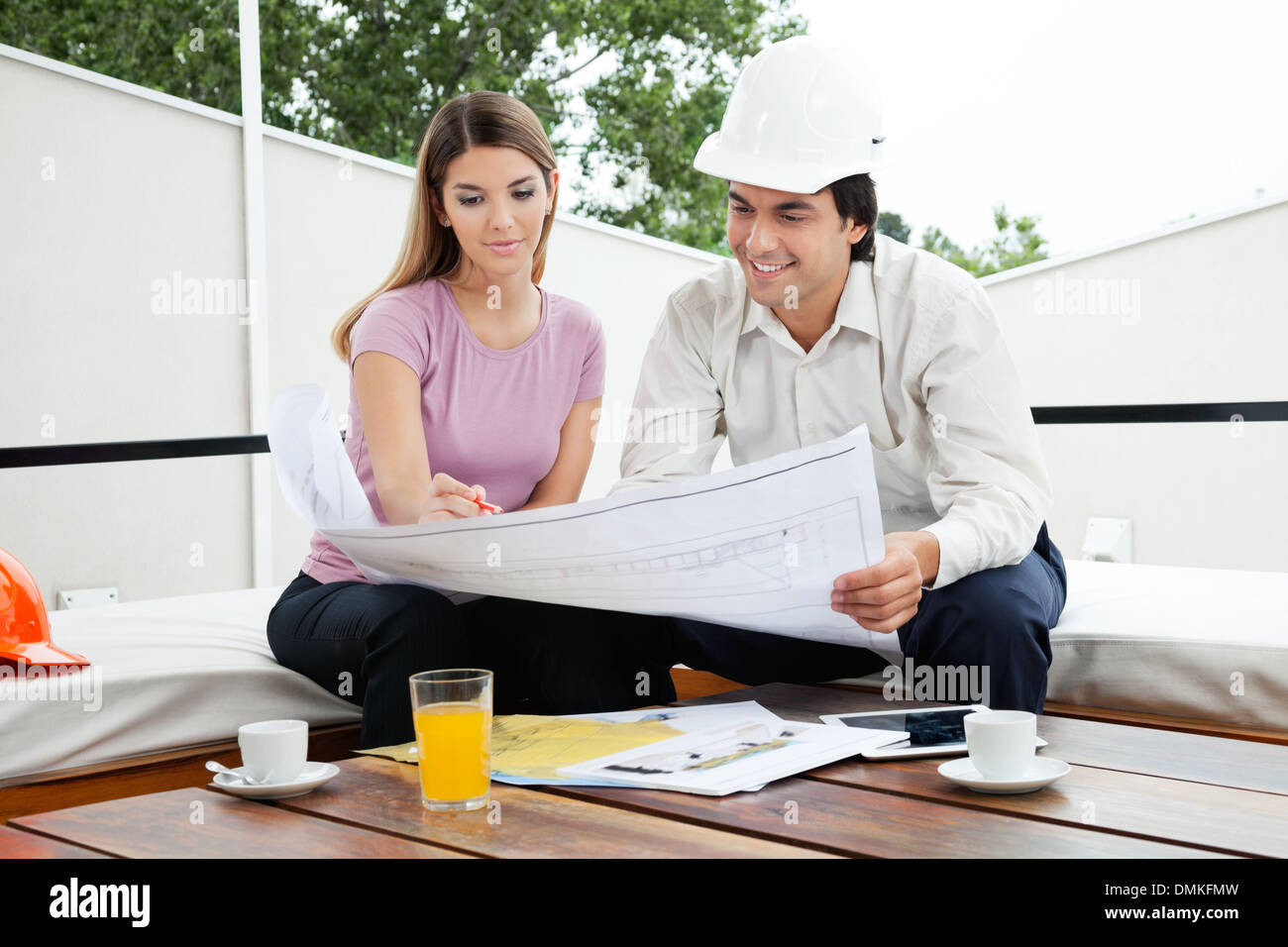 Architect plans house client hi-res stock photography and images - Alamy