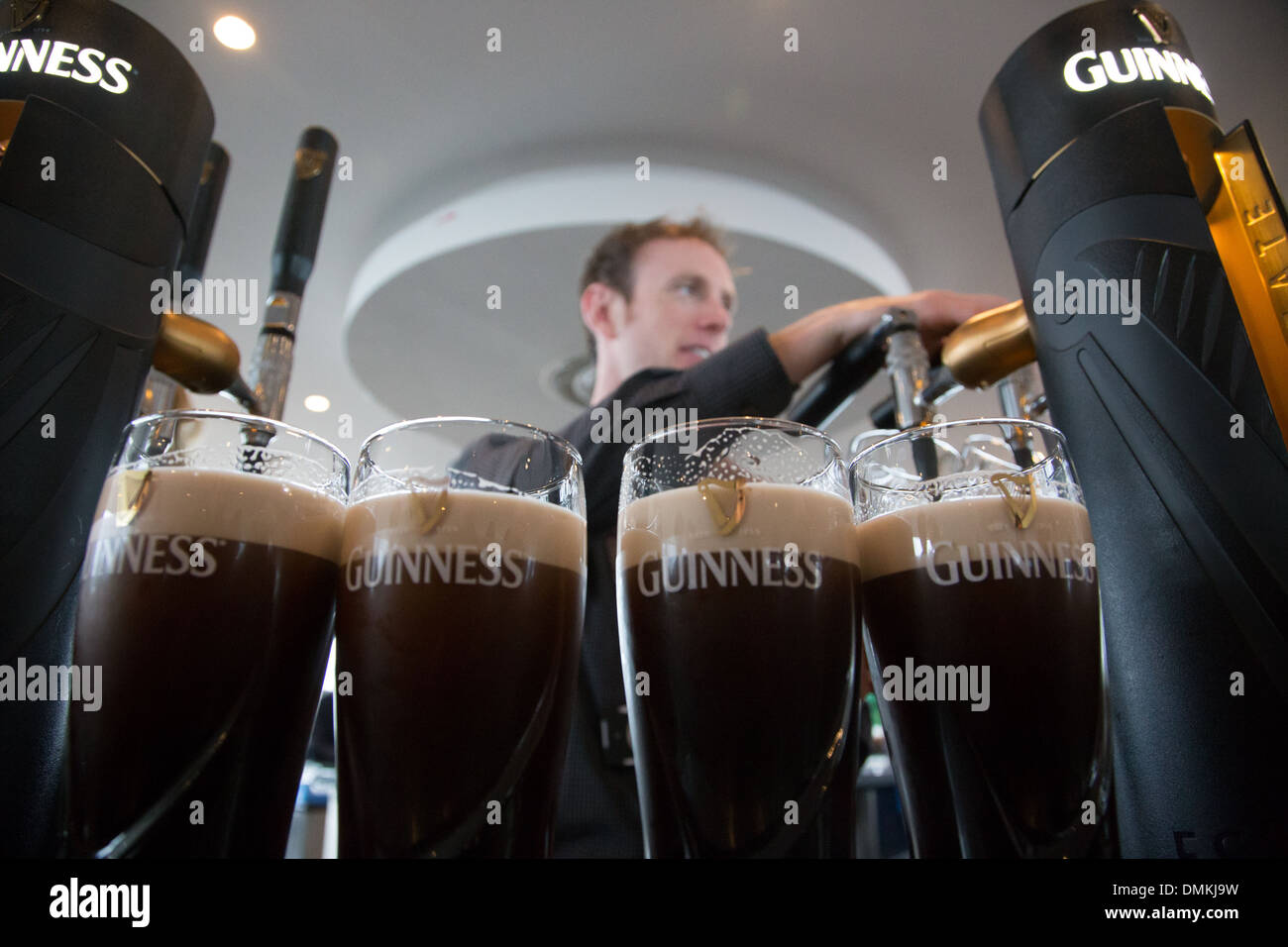 SERVING DARK DRAUGHT ALE AT THE OLD BREWERY, GUINNESS STOREHOUSE ...