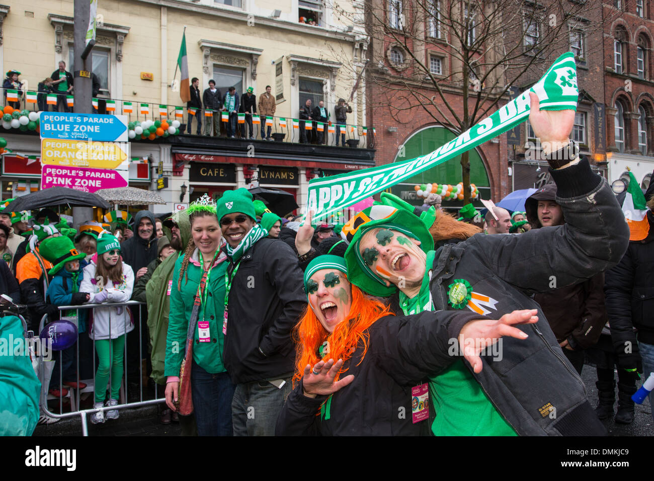 PARTICIPANTS IN THE PARADE WEARING GREEN HATS IN THE COLOUR OF THE ...