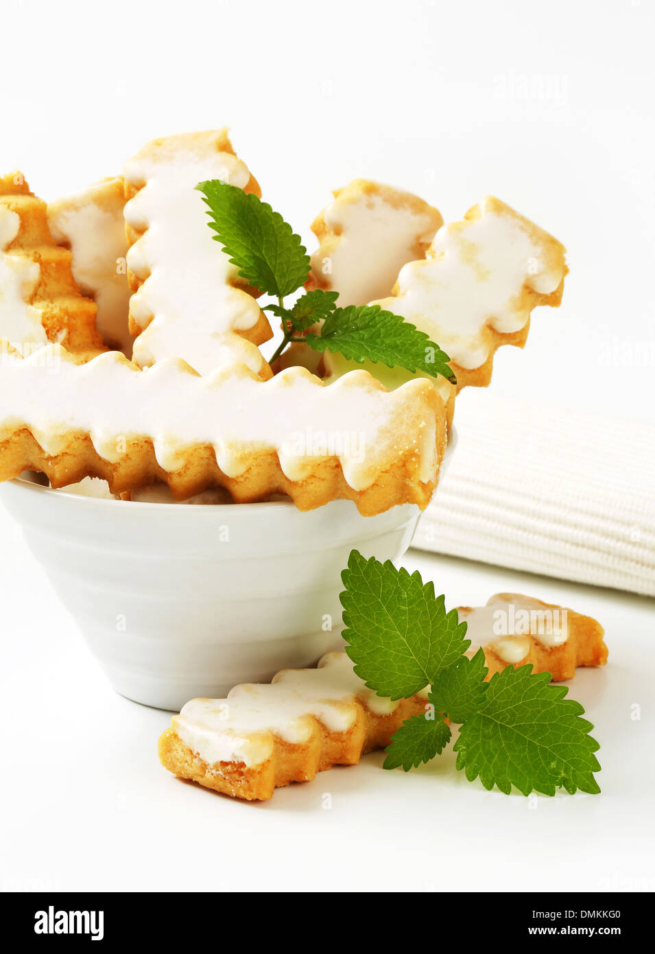 Vanilla cookies with white icing Stock Photo - Alamy