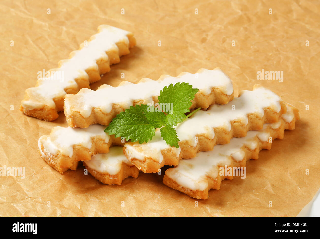 Vanilla cookies with white icing Stock Photo - Alamy