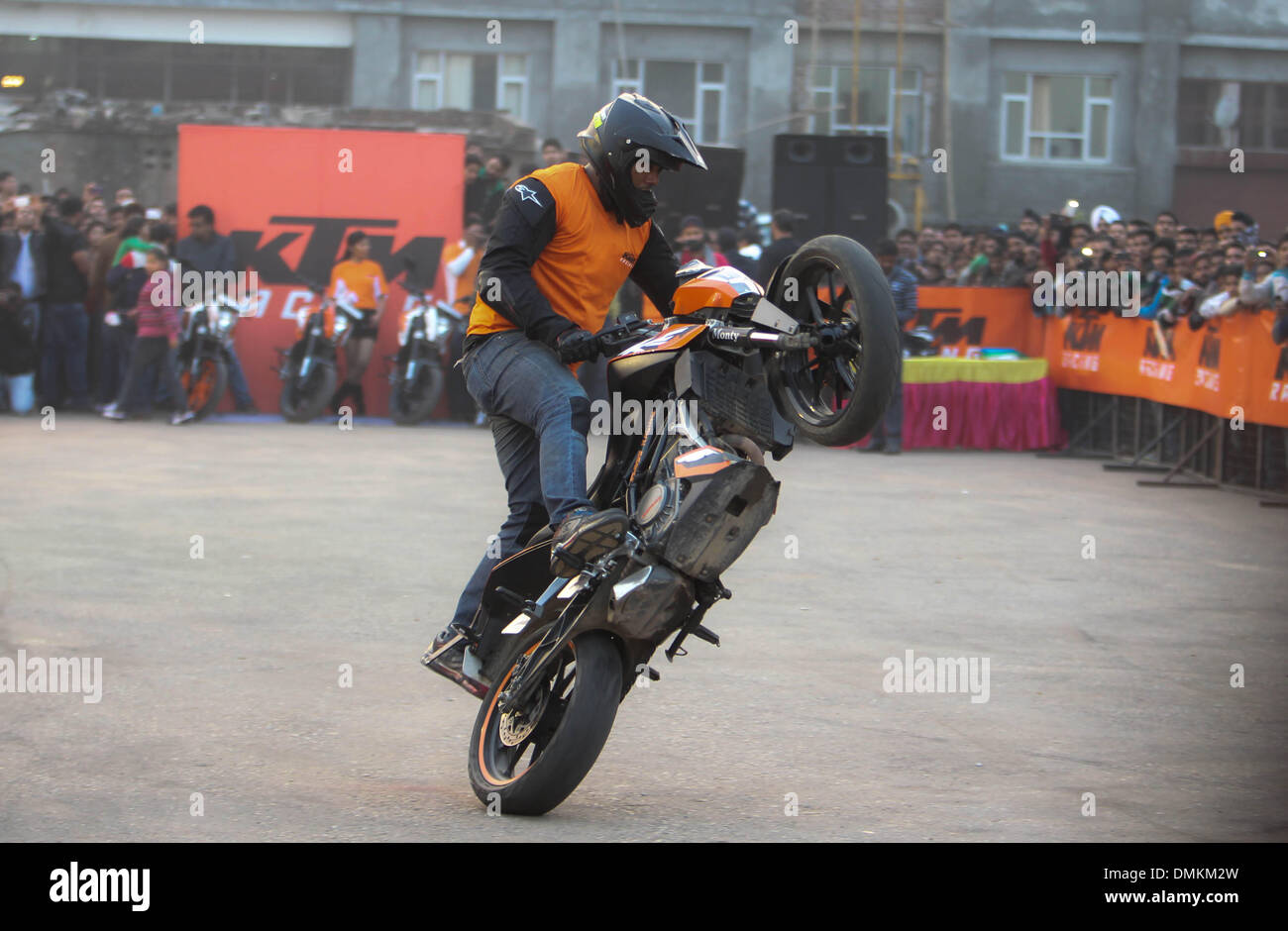 Jammu, Indian-controlled Kashmir. 15th Dec, 2013. A biker stunts during ...