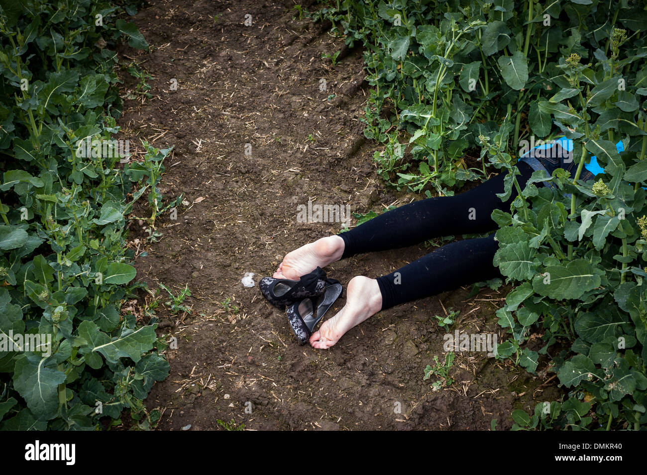 Staged Dead Girl in Field Stock Photo - Alamy