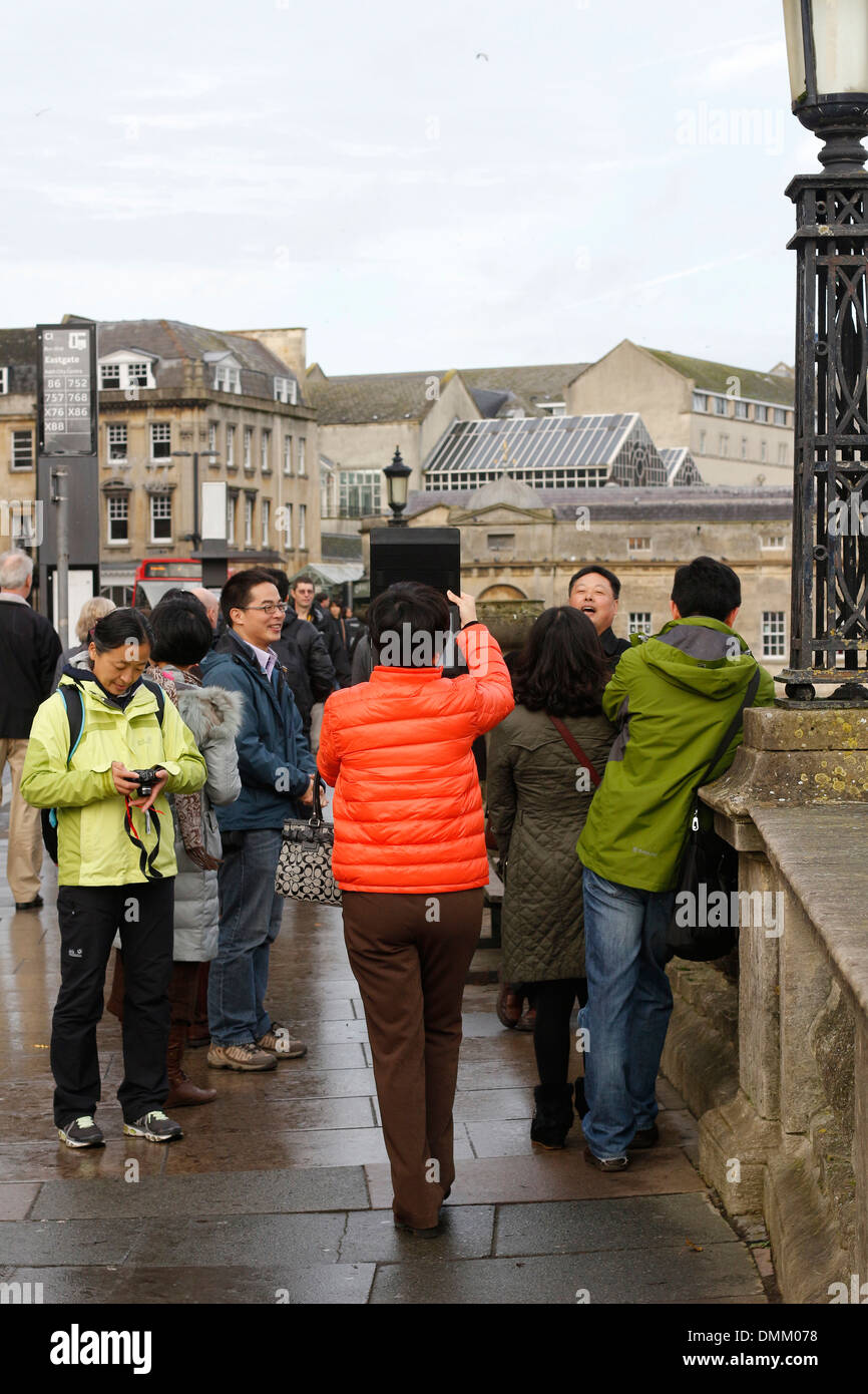 Tourists taking pictures in the City of Bath, England, December 2013 ...