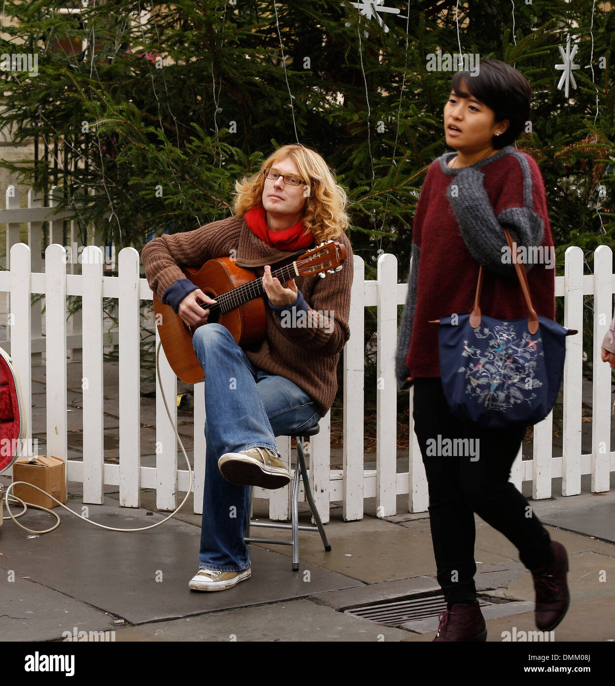 Street musician playing on the streets at The Christmas Market in the ...