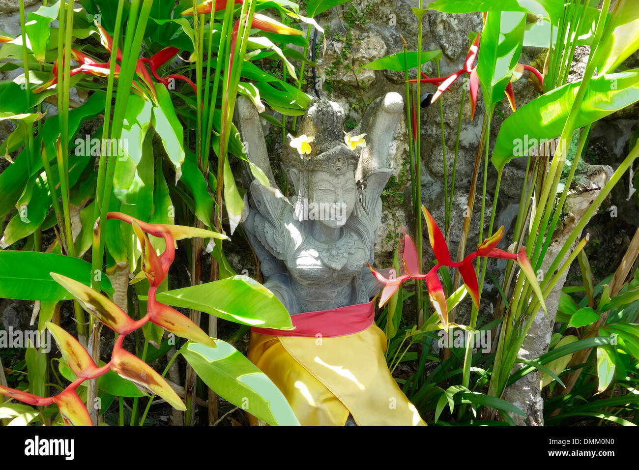 Hindu god amongst Bird of Paradise flowers in Bali Indonesia Stock ...
