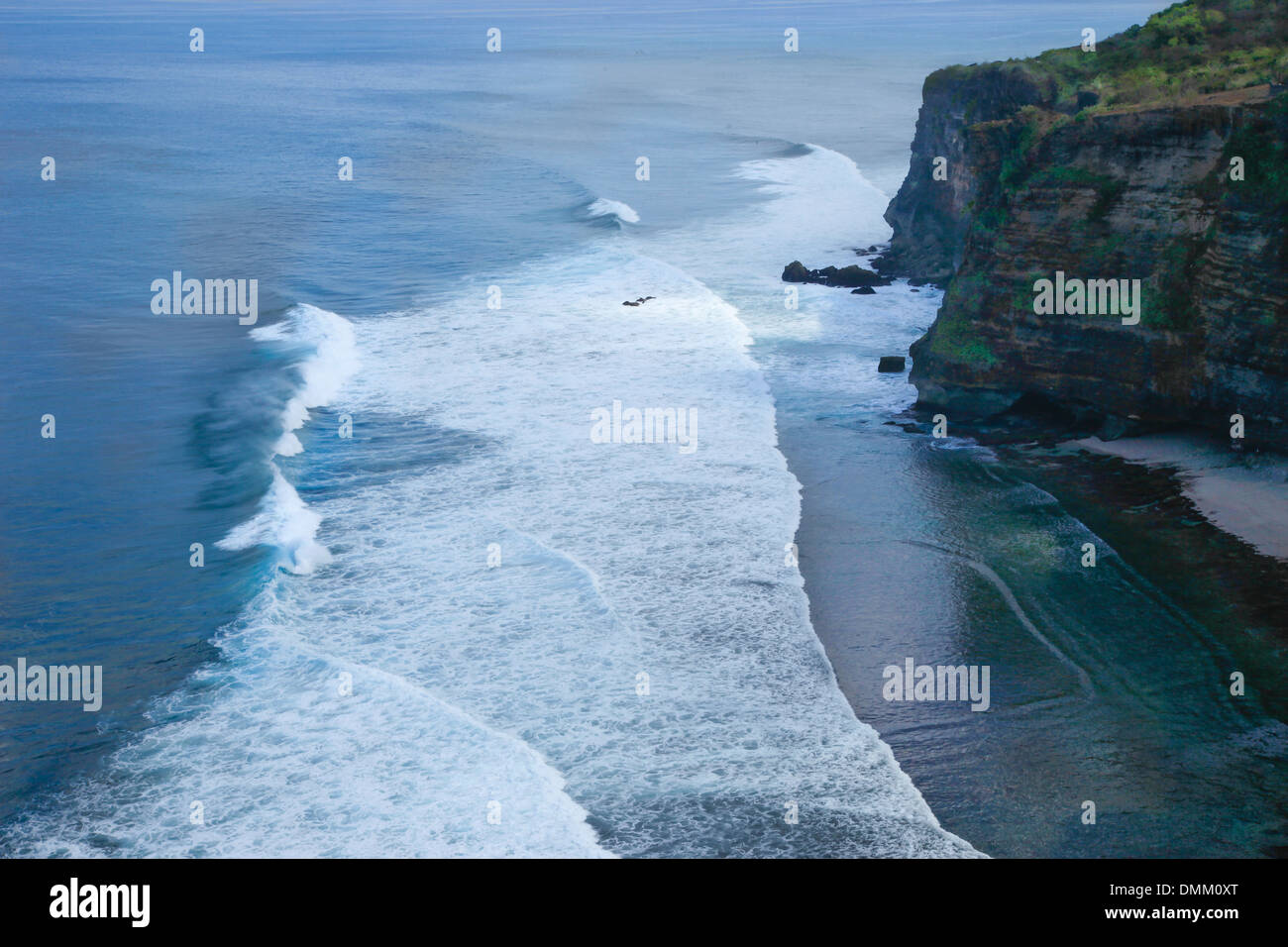 Ocean waves and cliffs Bali Indonesia Stock Photo - Alamy