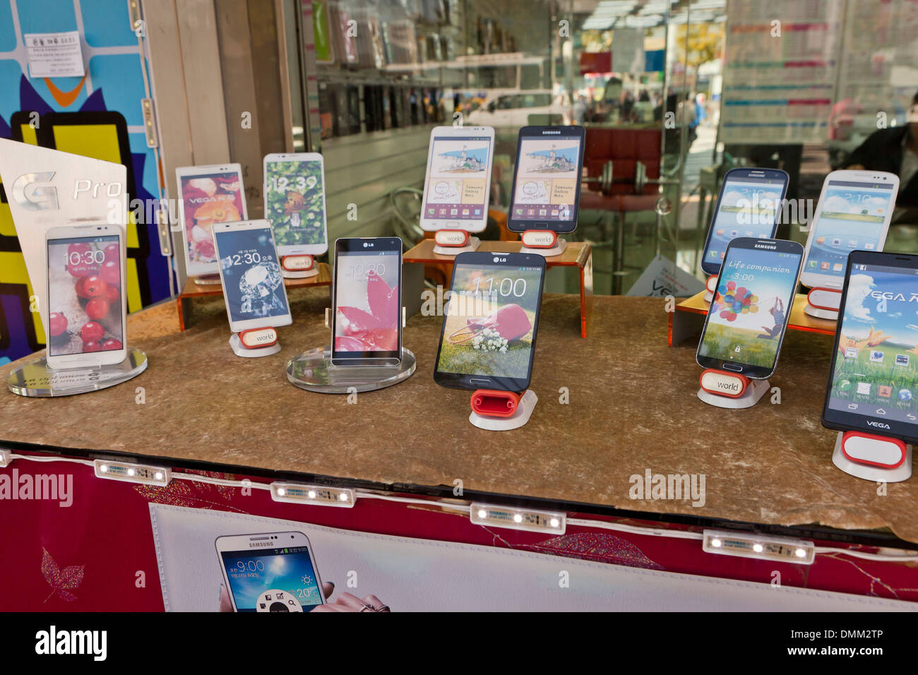 Mobile phone store window display - Busan, South Korea Stock Photo - Alamy