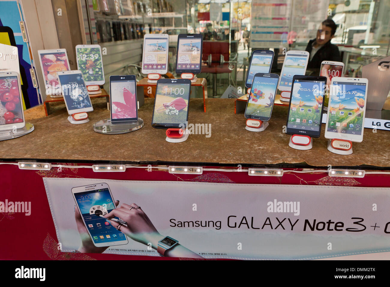 Mobile phone store window display - Busan, South Korea Stock Photo - Alamy