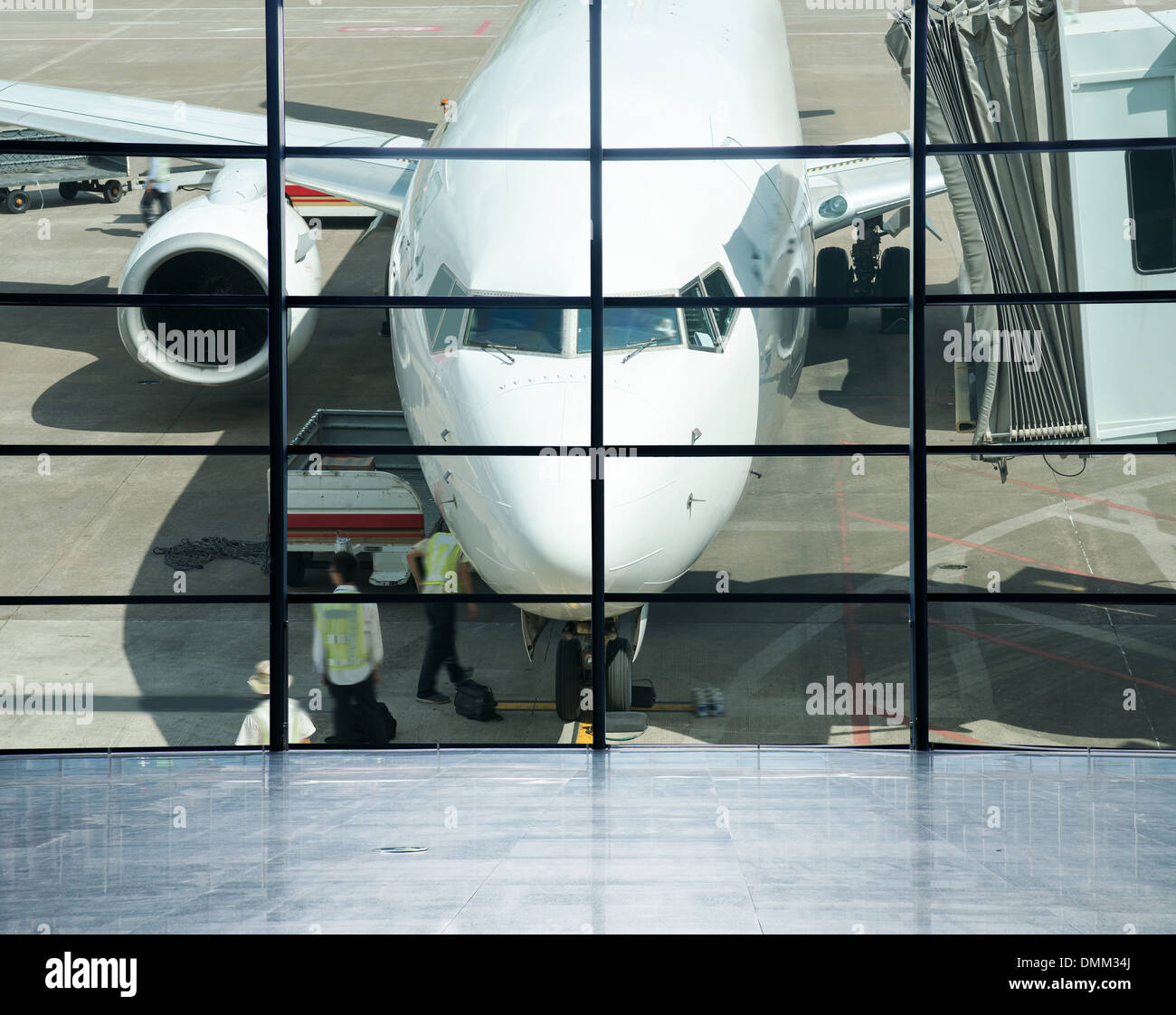 The plane at the airport on loading Stock Photo - Alamy