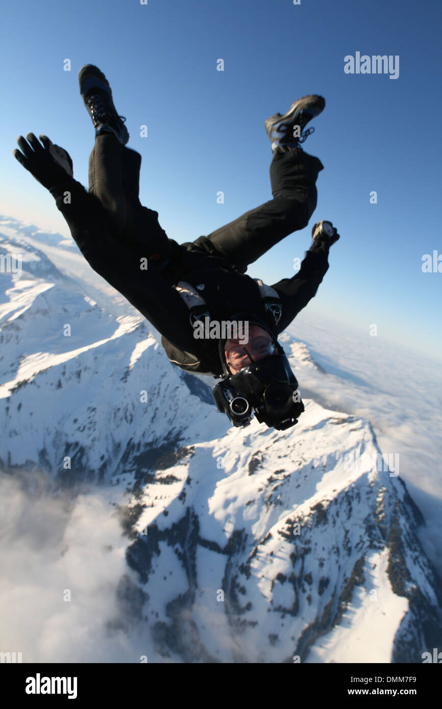 Skydiver flying head down position hi-res stock photography and images ...