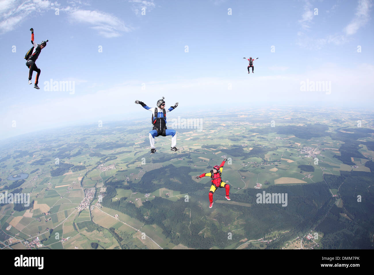 Freefly skydiving team is training formation sit-flying over a ...