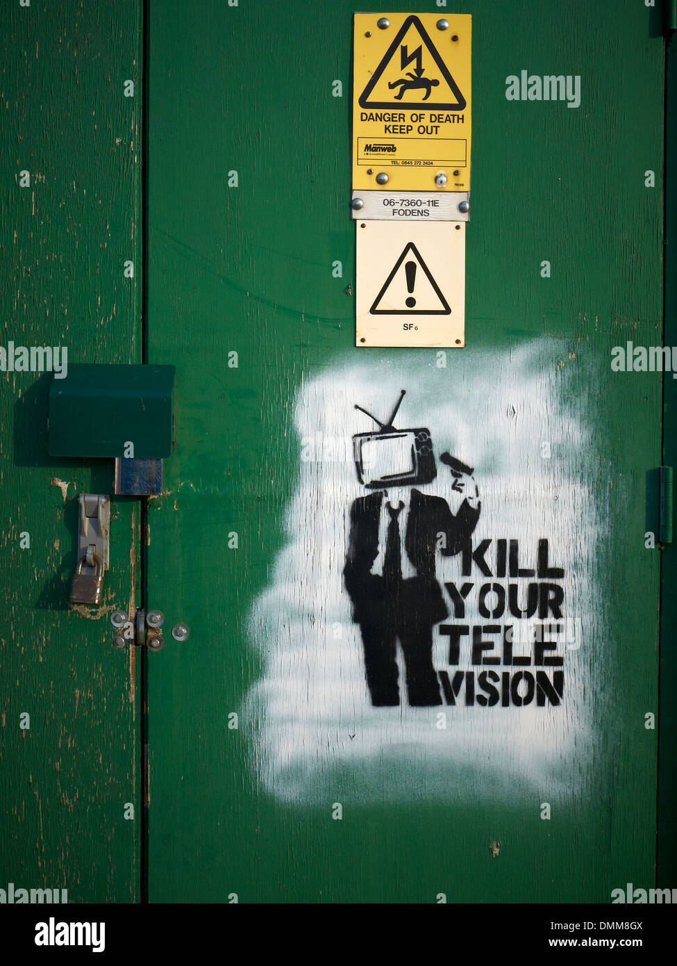 Graffiti, Kill your television on green sub station door UK Stock Photo ...