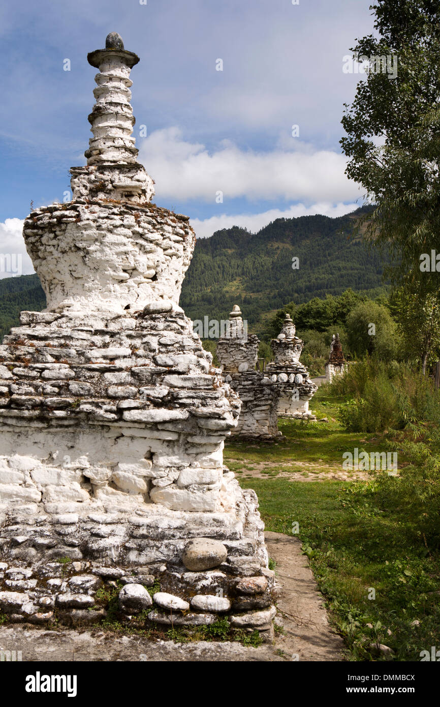 Bhutan, Bumthang Valley, Jambey line of old whitewashed stone chortens ...