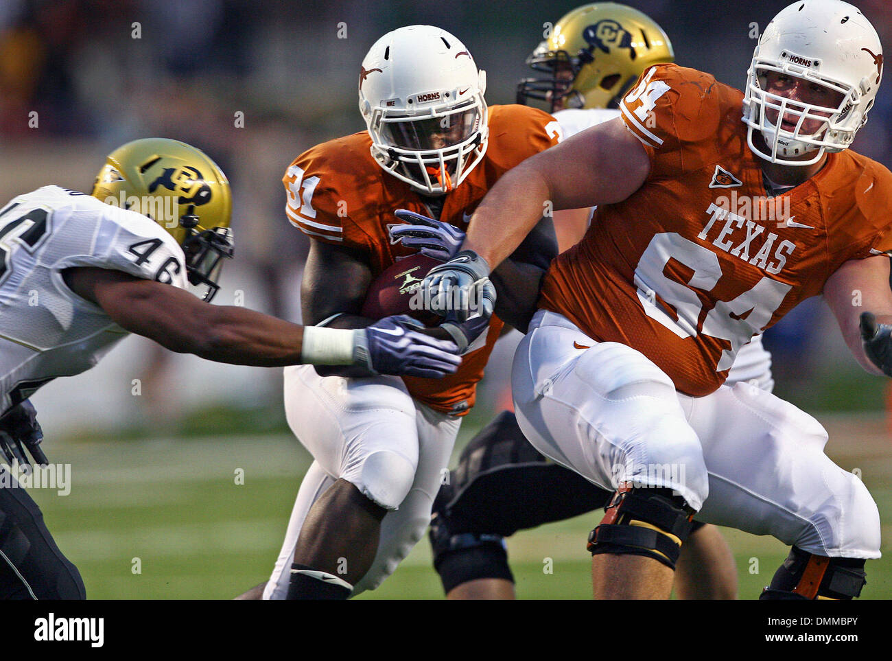SPORTS Longhorn running back Cody Johnson tries to push through his own ...
