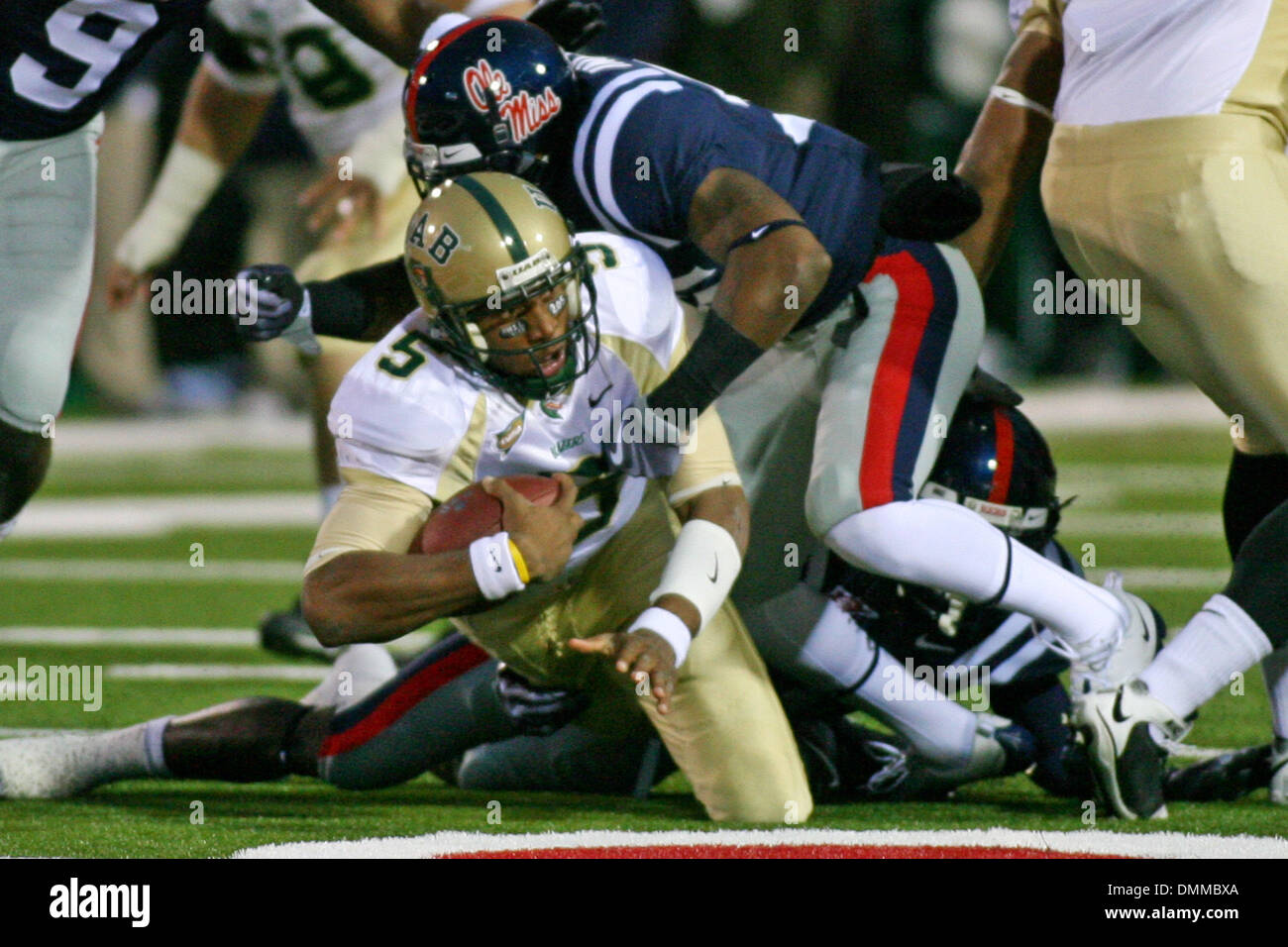 17 October 2009: QB Joe Webb (5) gets taken down by the Ole Miss line ...