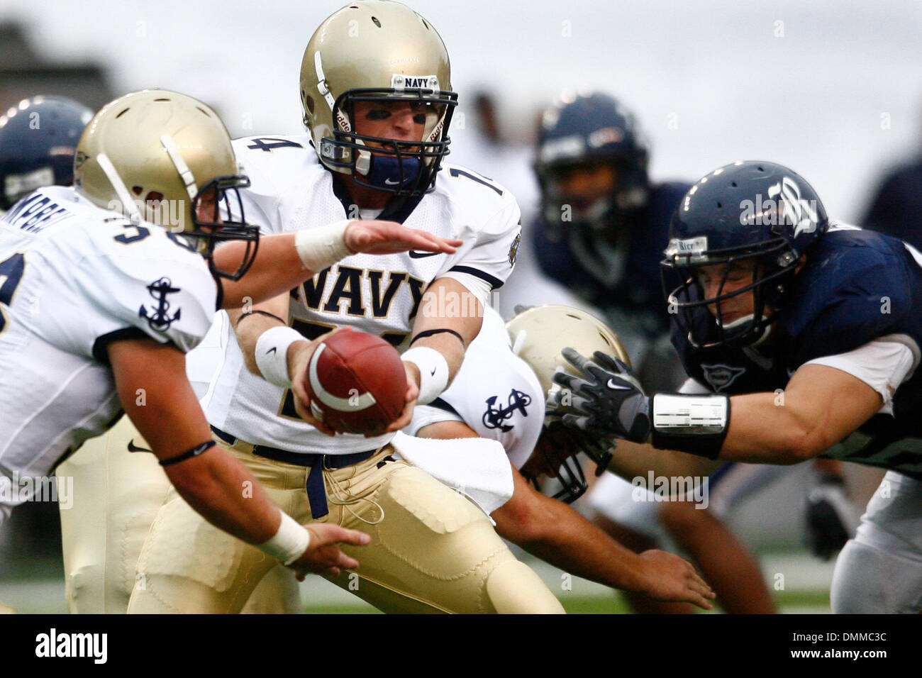 10 October 2009: John Howell (#5) of the Navy hands the ball off to ...