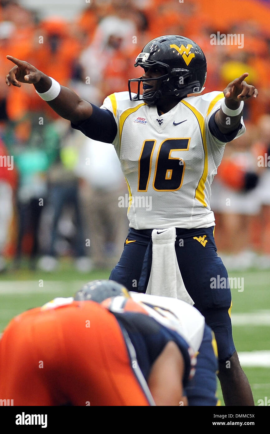 10 October 2009: West Virginia quarterback Jarrett Brown signals to his ...