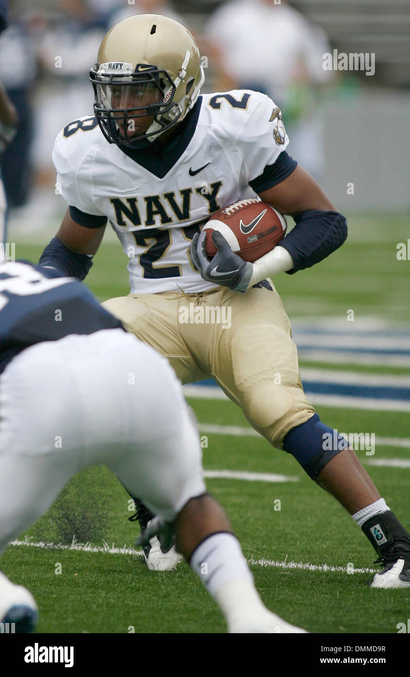 10 October 2009: Navy running back Marcus Curry (28) makes a cut back ...