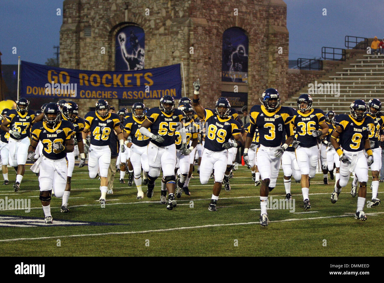 10 October 2009: The Toledo Rocket football team rushes onto the field ...