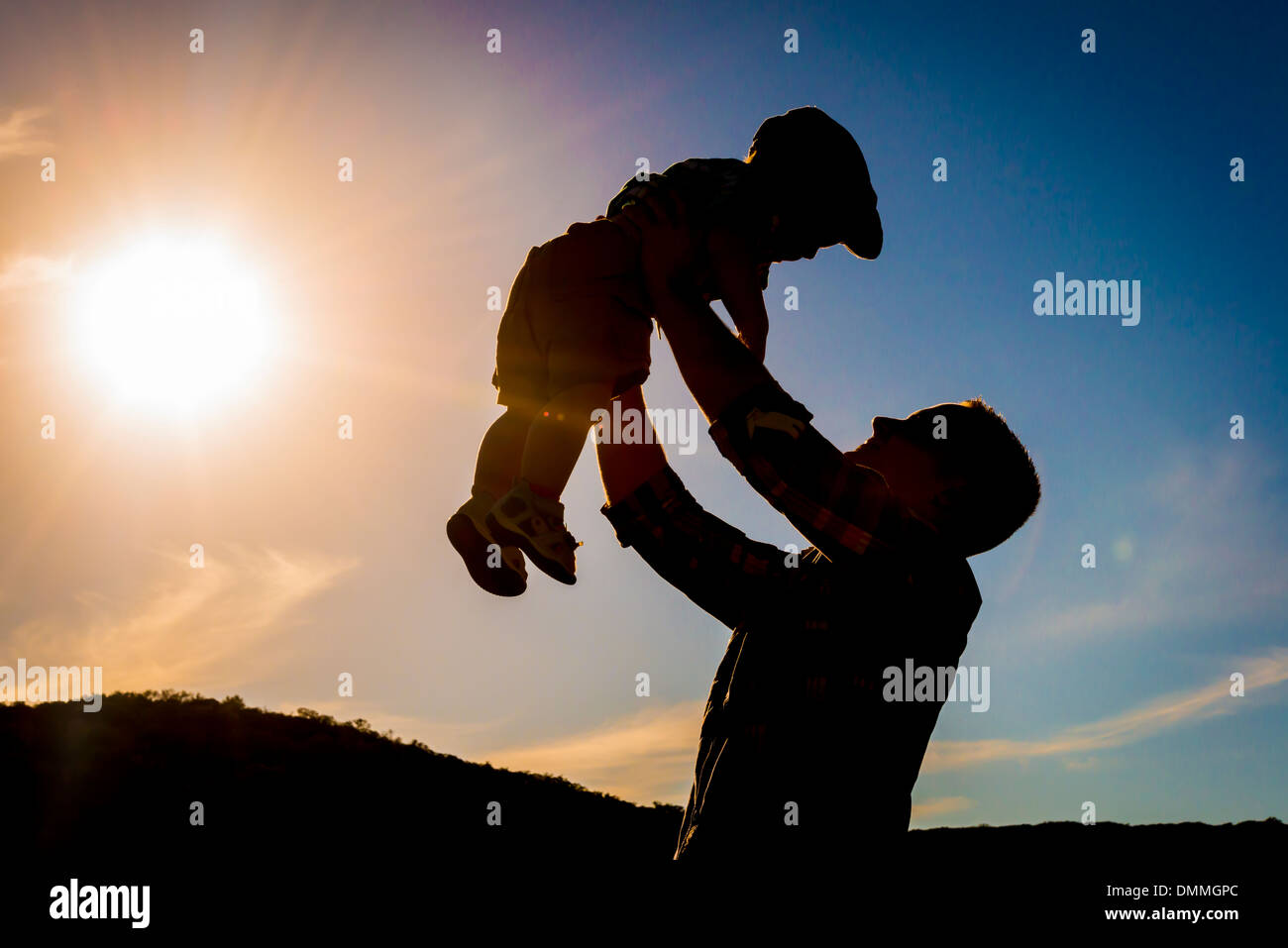 Father holding son aloft hi-res stock photography and images - Alamy