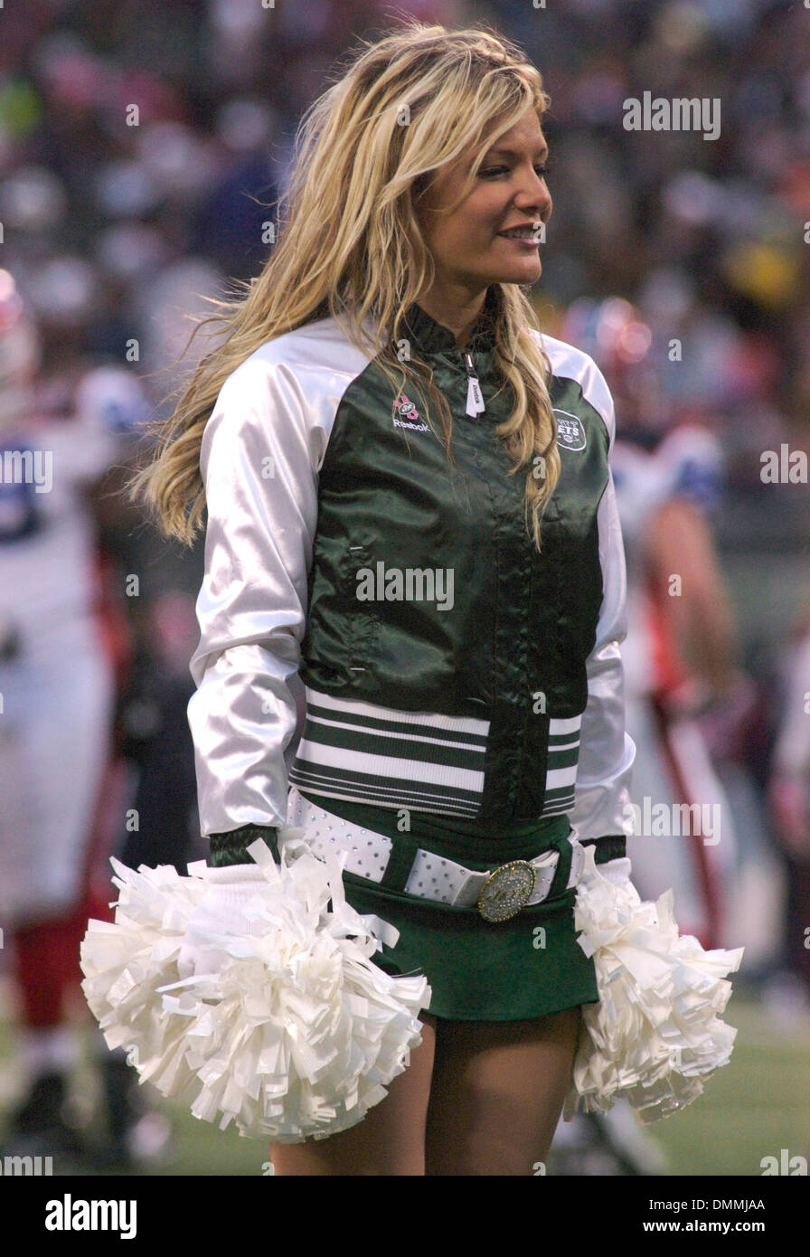 18 October 2009 : New York Jets cheerleaders get the fans into the game ...