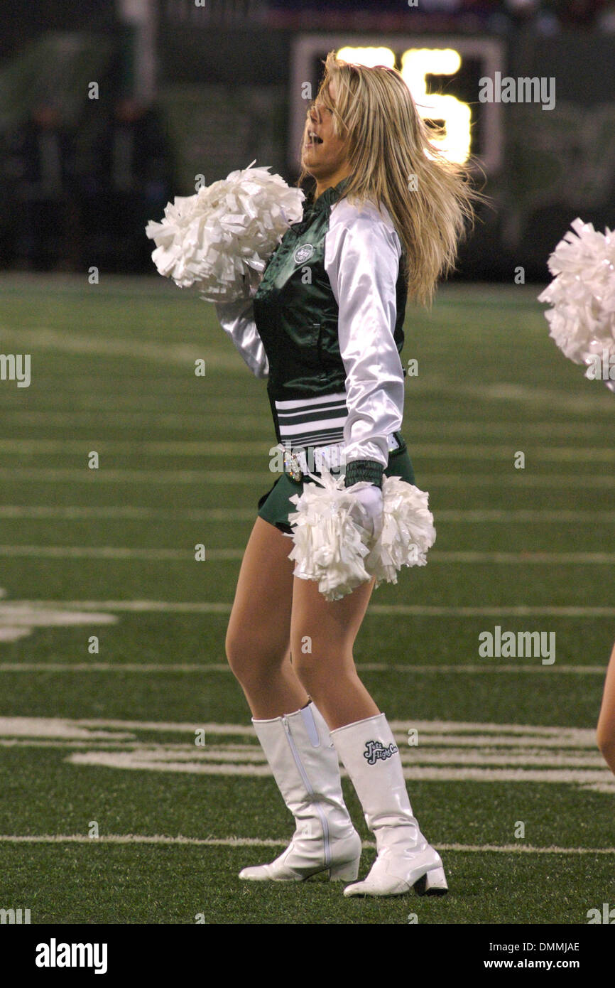 18 October 2009 : New York Jets cheerleaders get the fans into the game ...