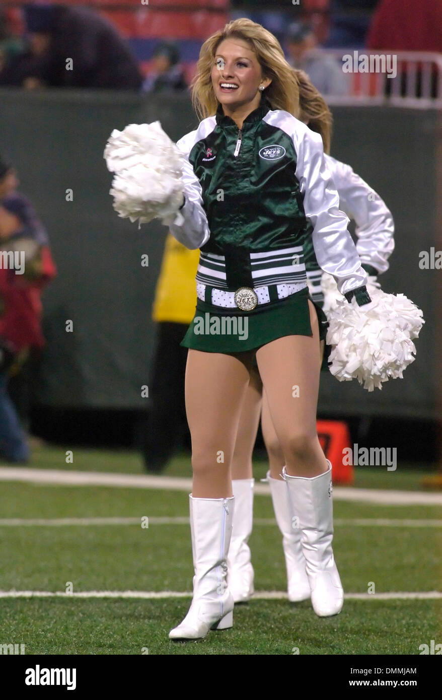 18 October 2009 : New York Jets cheerleaders get the fans into the game ...
