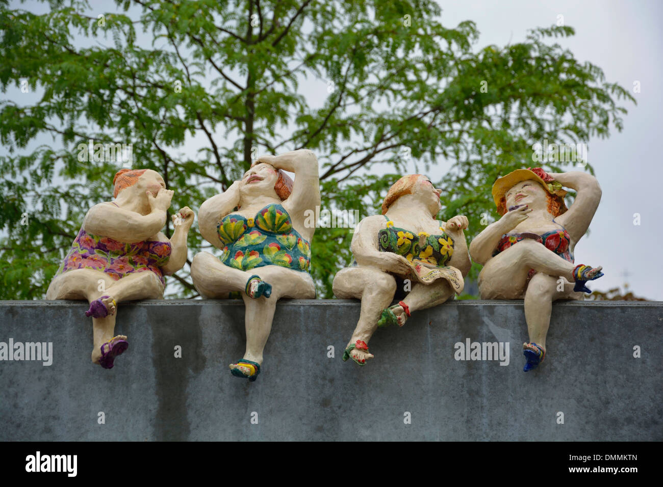 Pottery figures of four women Stock Photo - Alamy