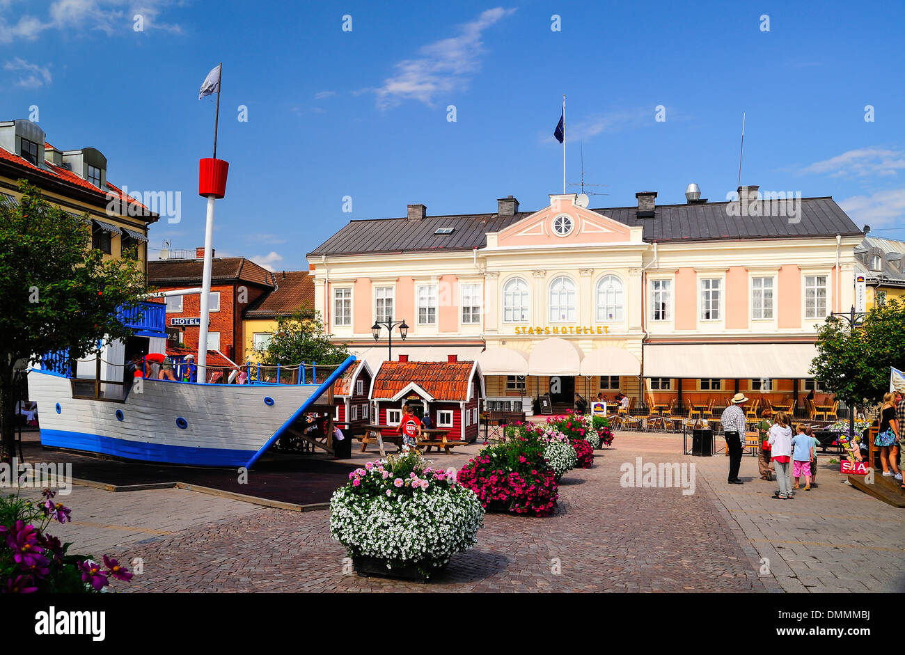 Sweden, Smaland, Vimmerby, Town square with hotel and miniature ship ...