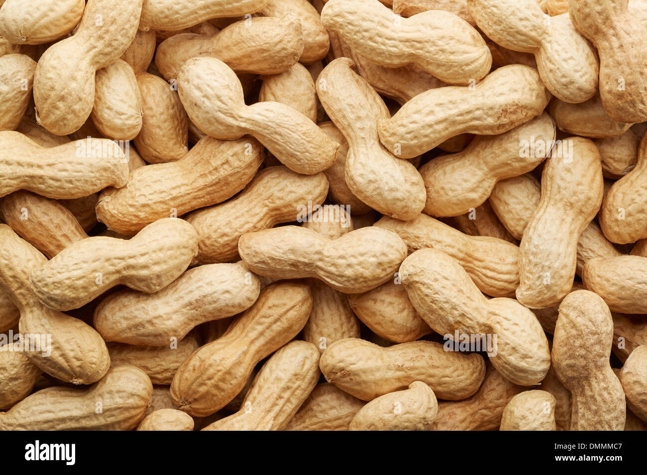 Peanuts in shell texture background Stock Photo - Alamy