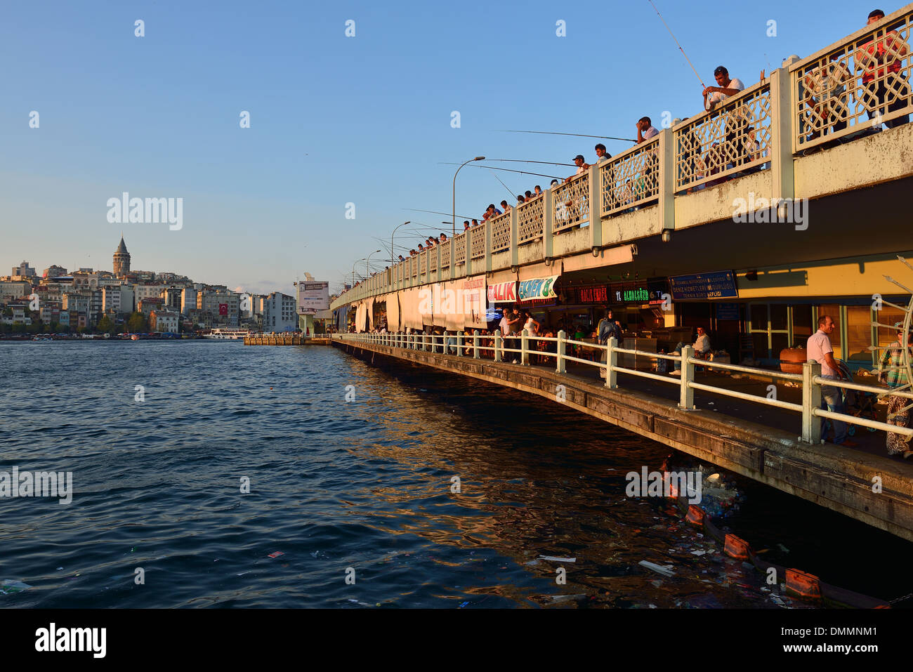 Turkey, Istanbul, Galata Bridge at Golden Horn at sunset Stock Photo ...