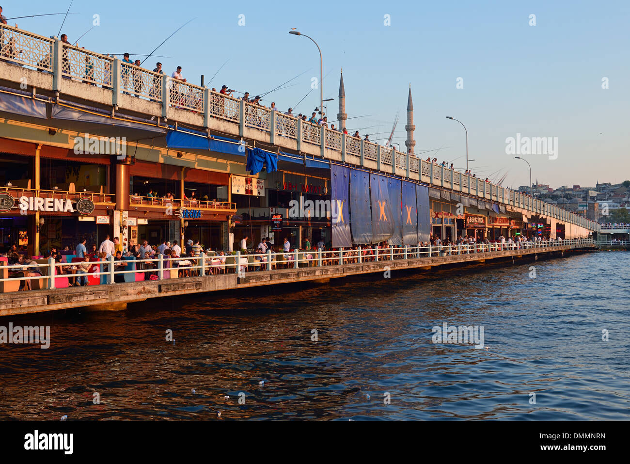 Turkey, Istanbul, Galata Bridge at Golden Horn at sunset Stock Photo ...