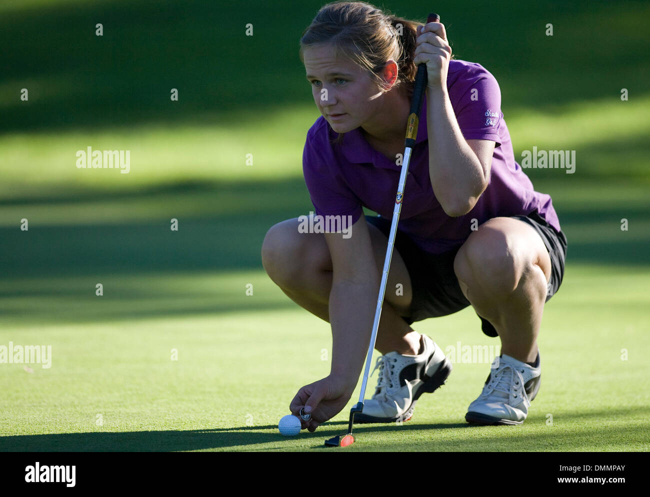 Sammy Spradlin eyes up the last hole Monday at the NSCIF Girls Gold ...
