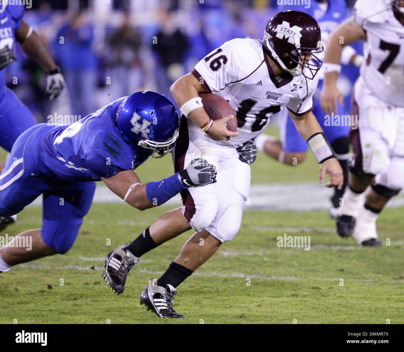 Kentucky's Taylor Wyndham pulled down Tyson Lee for a second quarter ...