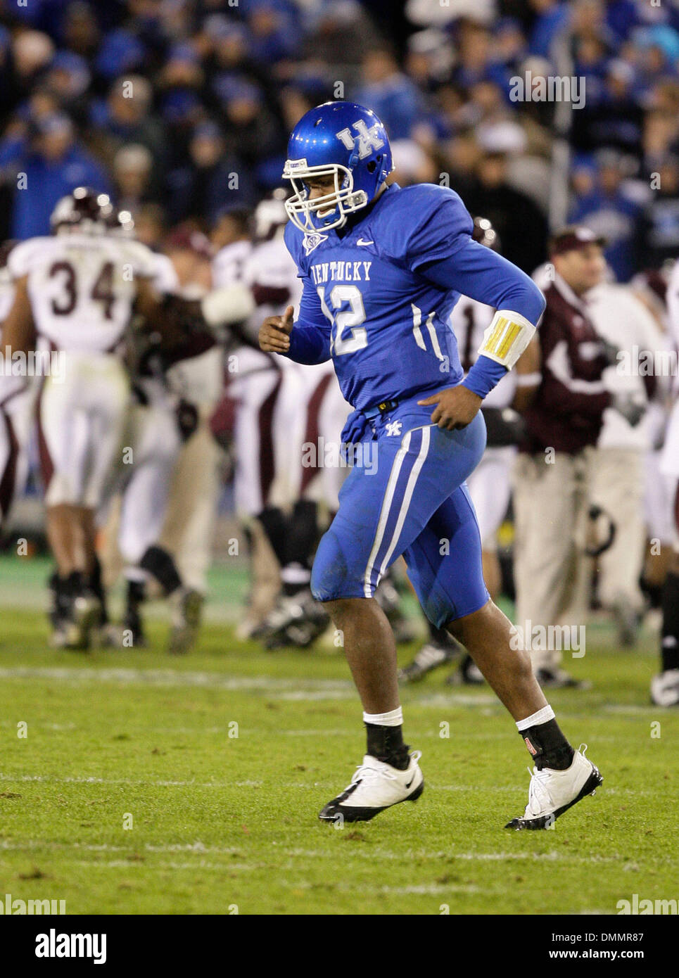 UK quarterback Morgan Newton leaves the field after throwing a 4th ...
