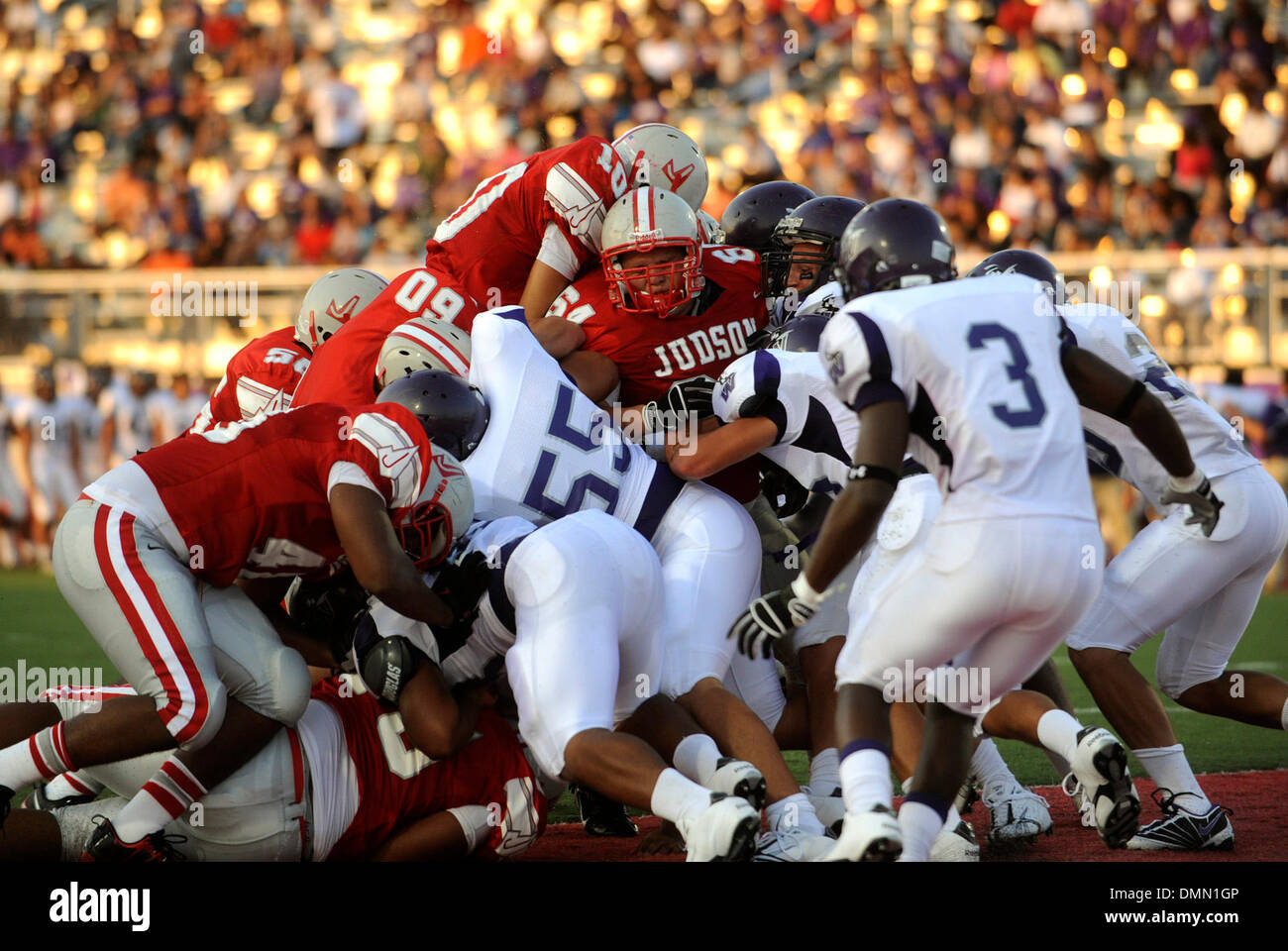 Judson quarterback Cody Boswell, at top, crossing the plane of the goal ...