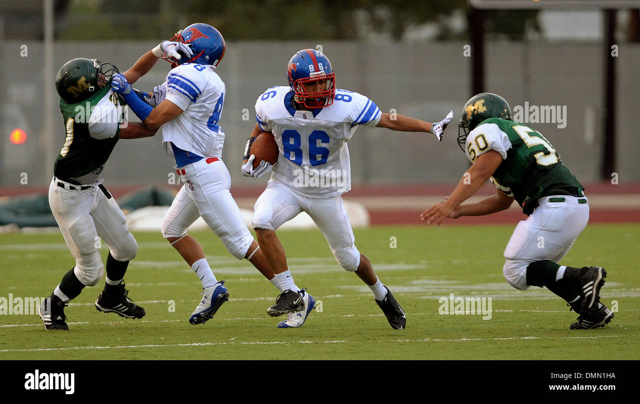 Jefferson wide receiver Albert Torres stiff arms McCollum linebacker ...