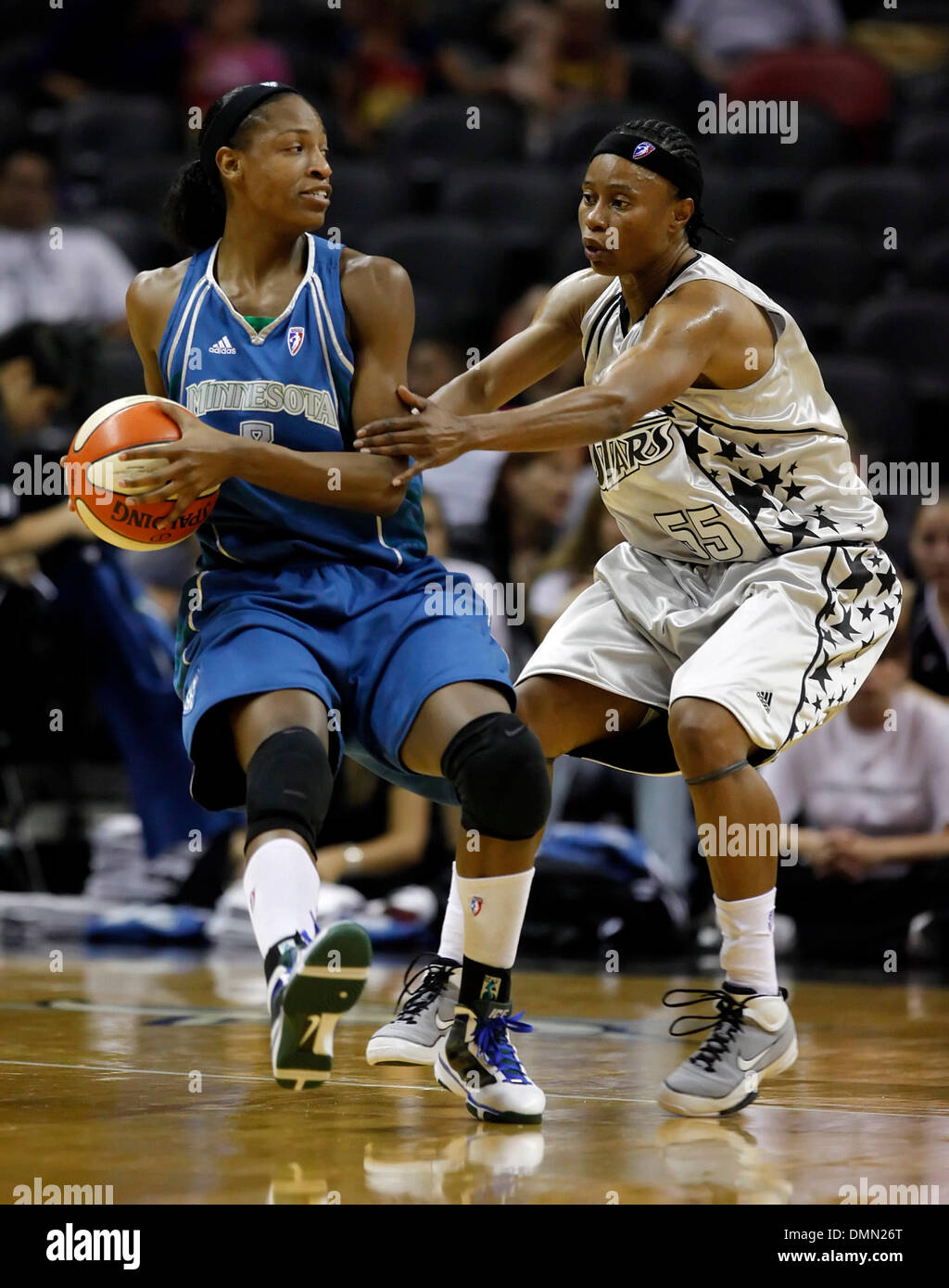 SilverStars' Vickie Johnson (55) tightly defends against Minnesota Lynx ...