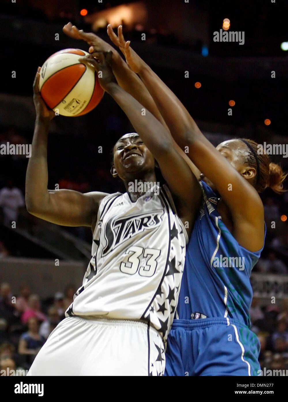 SilverStars' Sophia Young (left) collides with Minnesota Lynx's Charde ...