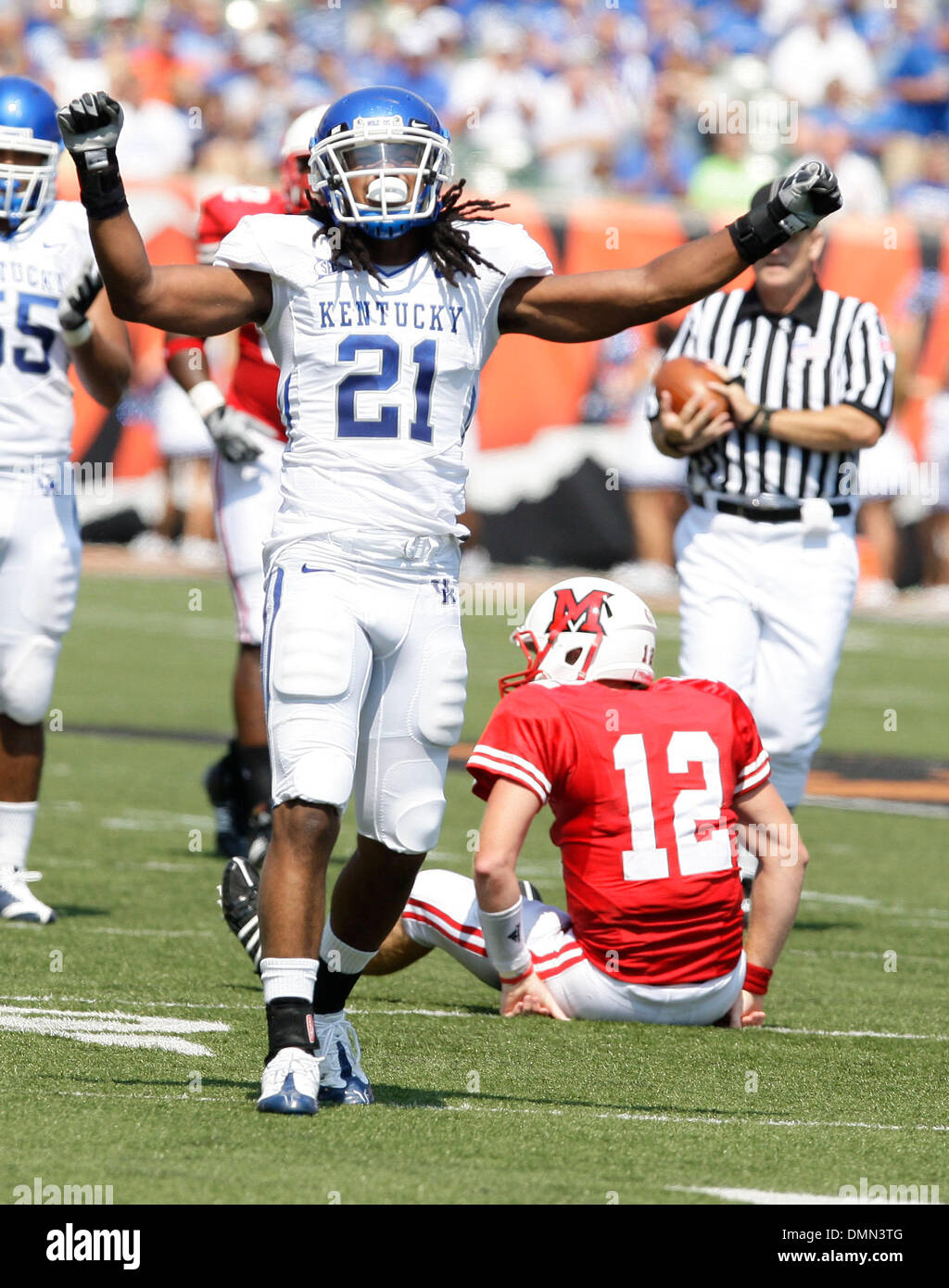 Winston Guy, celebrated a sack on Miami quarterback Daniel Raudabaugh ...