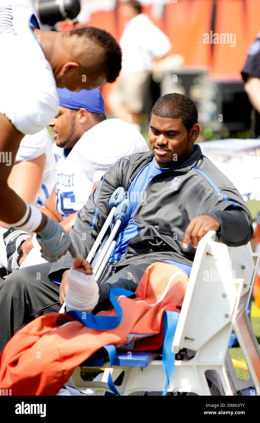 Kentucky center Marcus Davis, sat on the bench with a broken foot as ...