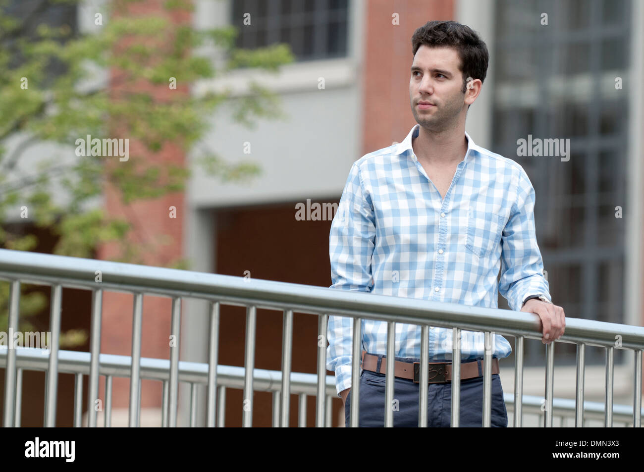 1 man on handrail hi-res stock photography and images - Alamy