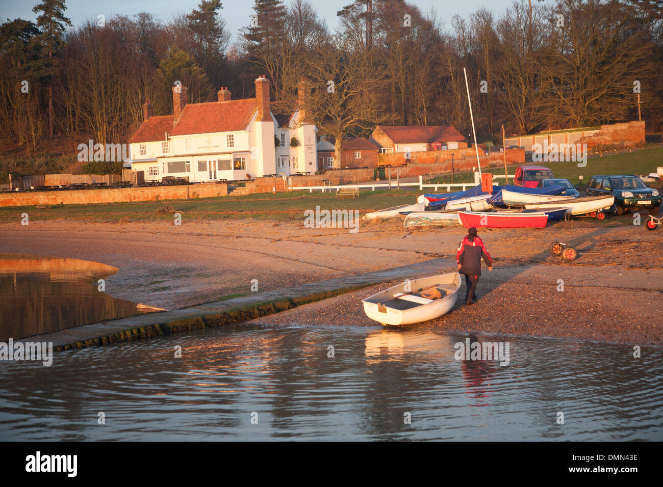 Boats by River Deben and Ramsholt Arms pub Suffolk England Stock Photo ...